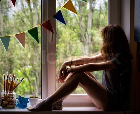 Teen Girl Sitting On A Windowsill 5 Stock Image Colourbox