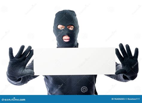 Robber In Black Clothes And Mask With A Poster In Hands Stock Image Image Of Killer Banner