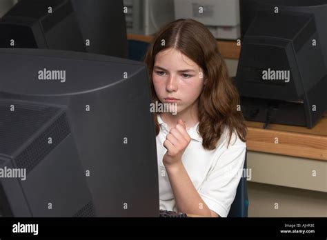 A Female Babe Working At A Computer In A Babe Computer Lab Stock Photo Alamy