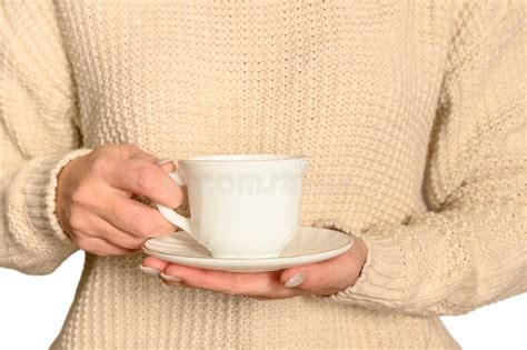 A Woman In A White Jumper Holds A White Cup And Saucer Autumn Concept
