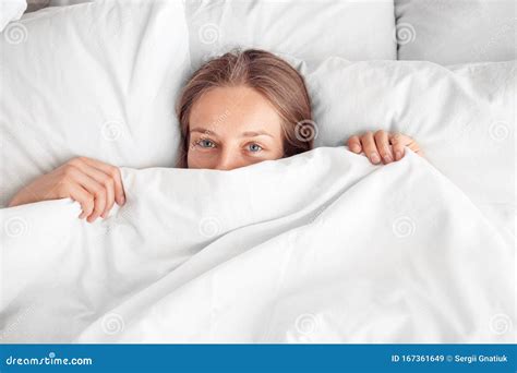 Morning At Home Woman Lying On Bed Under Blanket Smiling Playful Top