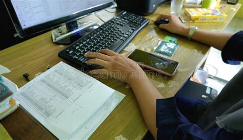 A Woman S Hand Is Operating A Computer Device On The Table Stock Photo Image Of Internet