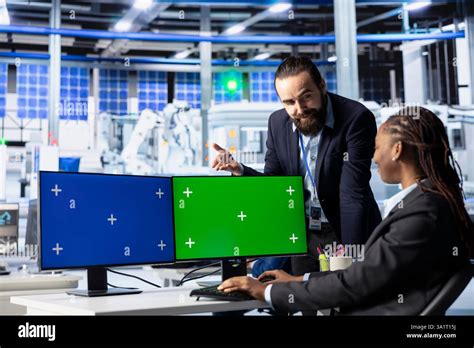 Happy Photovoltaics Factory Manager Using Isolated Screen Pc To Show Worker How To Optimize