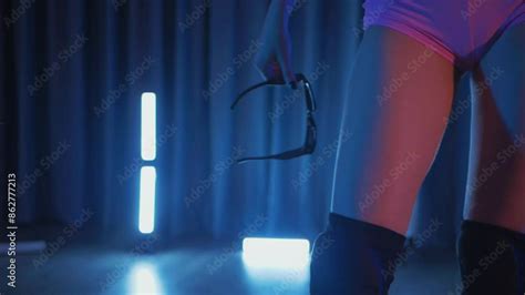 Young Woman In Pink Wig In Anime Style Erotically Dancing Twerk In