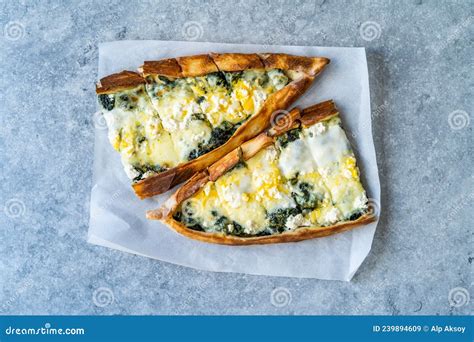Traditional Turkish Cuisine Pide With Spinach Cheese And Egg Stock