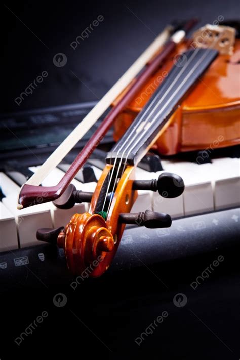 Violin And Piano Keys On Black Photo Background And Picture For Free