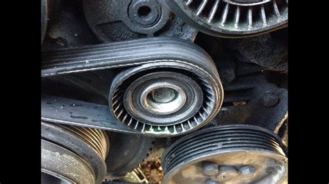 HOW TO Replace Belt Tensioner Idler Adjusting Pulley 97 03 BMW 5 SERIES
