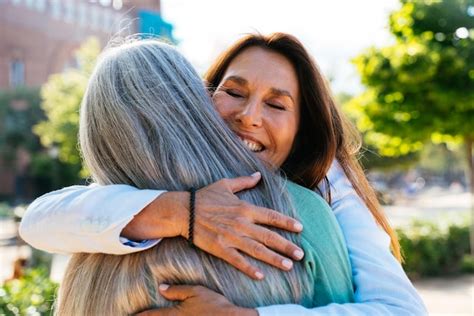 Premium Photo Beautiful Senior Women Bonding Outdoors In The City