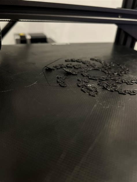 Trying to print a cat for my girlfriend and it keeps shifting after the first layer any help ...