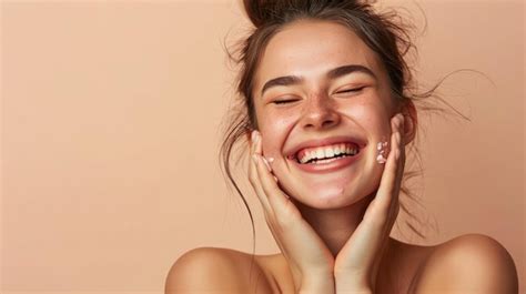 Premium Photo Happy Beautiful Girl Holding Her Cheeks With A Laugh