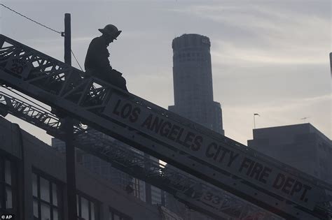 Eleven Firefighters Injured And Building Ablaze After Massive Explosion