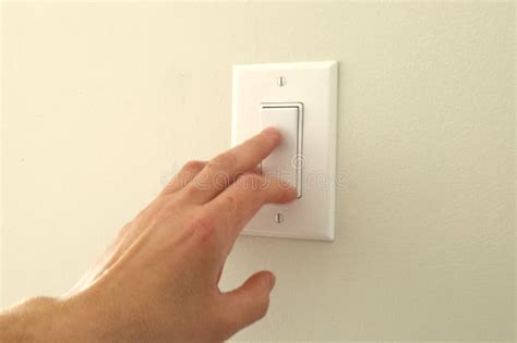hand pressing wall light switch stock image image of hand finger