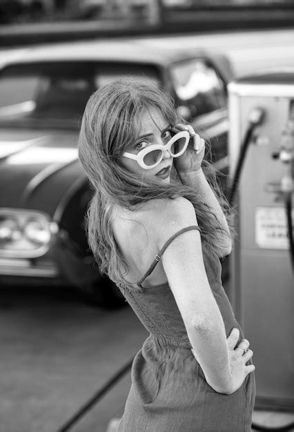 Premium Photo Woman Refuel The Car Gas Station Lady Against Red Retro