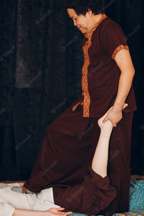 Premium Photo Thai Man Making Classical Thai Massage Procedure To