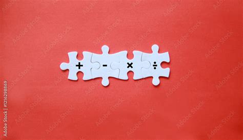 Jigsaw Puzzle With Plus Minus Multiplication And Division Symbols Four Basic Mathematical