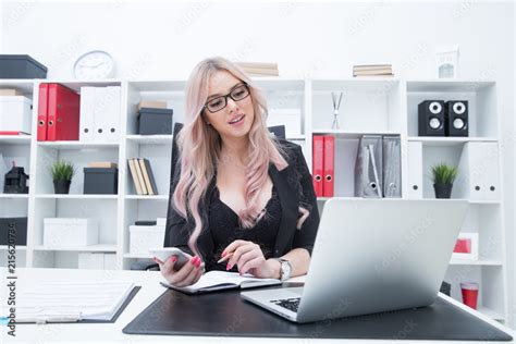 Sexy Girl In The Workplace At The Computer Stock Photo Adobe Stock