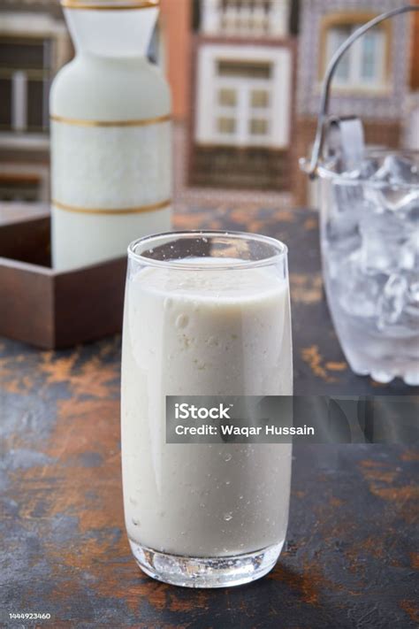 Plain Lassi Served In Glass Isolated On Table Top View Of Punjabi