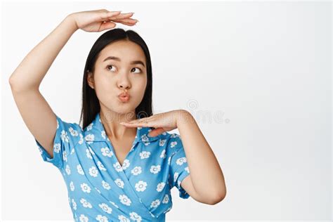 Beautiful Silly Asian Girl In Blue Anime Wig Smiling Happy Showing