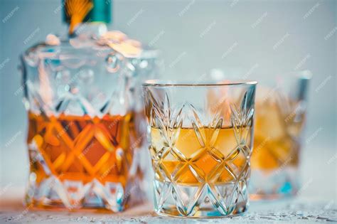 Premium Photo Aged Tequila In Crystal Glasses For Sipping