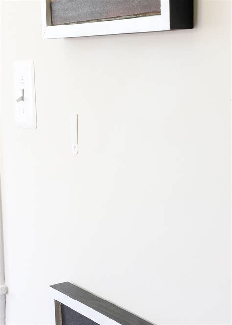 How To Remove Command Strips Without Damaging Your Walls The Homes