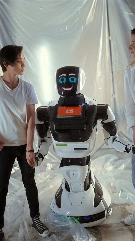 Video Of Happy Woman Interacts With An Ubtech Robot Free Stock Video