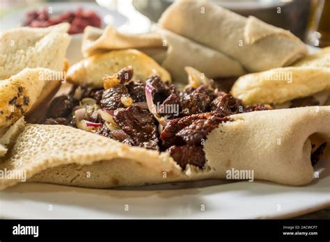 Tibs And Injera Served At A Siga Bet A Combined Butcher And Restaurant