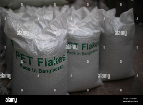 Sacks Of Plastic Flakes Made By Used Plastic Bottles At A Recycling