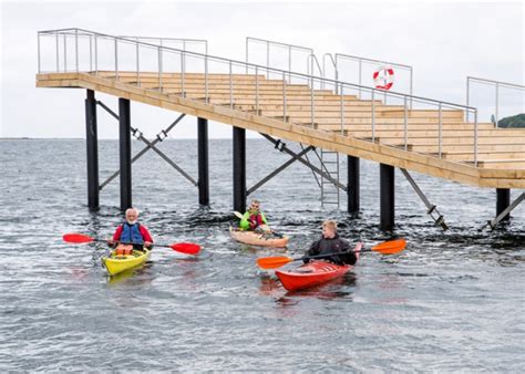 Sloped Decking Creates Waterfront Slides At Faaborg Harbour Bath