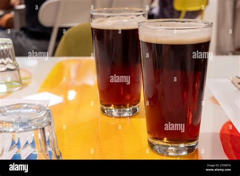 Pint Glasses Of Cold Fresh British Ipa Ale And Lager Beer Served In Old