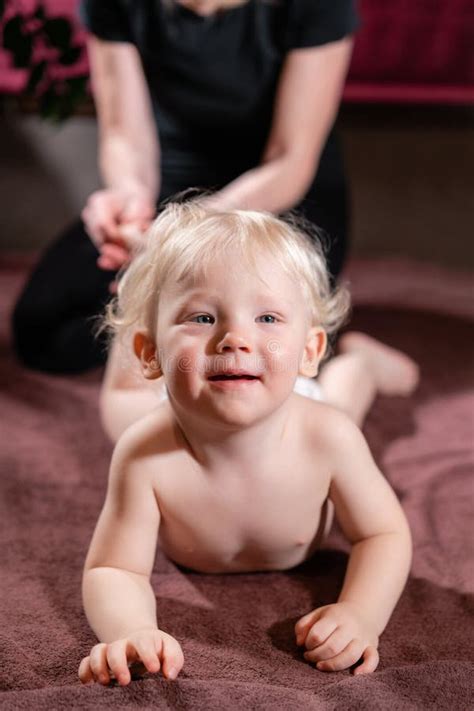 Mother Makes Massage To Her Baby Home Stock Photos Free Royalty Free Stock Photos From