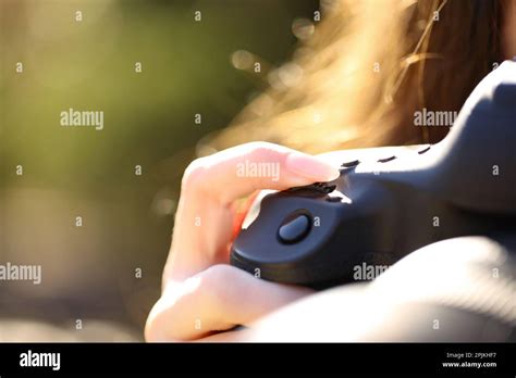 close up of a photographer finger adjusting shutter speed with dial on