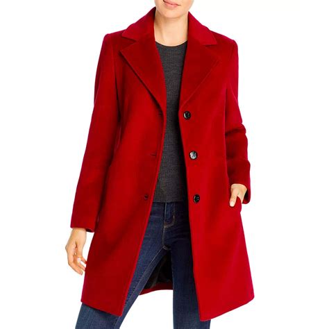 Download Stylish Red Coat On A Mannequin Wallpaper