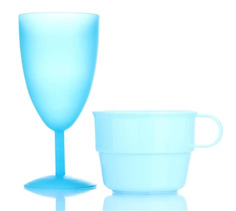 Premium Photo Bright Plastic Tableware Isolated On White