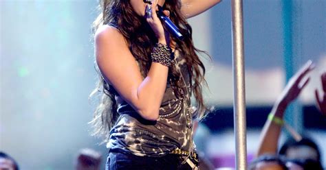 Pole Dancing 101 Miley Cyrus Raciest Outfits Us Weekly