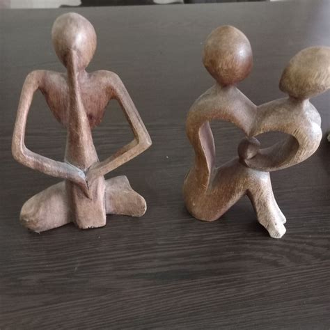 کمدا قیمت و خرید مجسمه چوبی برند هندی رنگ قهوه ای سایز متوسط