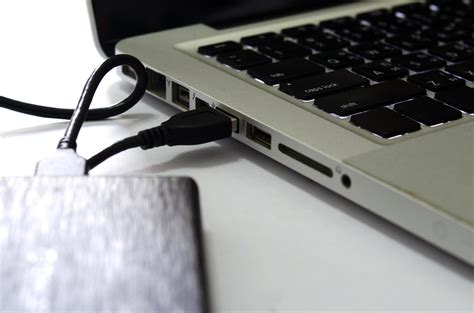 External Hard Drive Plugged Into USB Port Stock Photo At Vecteezy