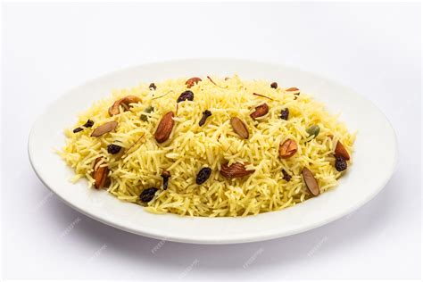 Premium Photo Kashmiri Sweet Modur Pulao Made Of Rice Cooked With