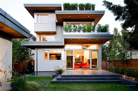 Эффектный небольшой двухэтажный домик Architecture Architecture