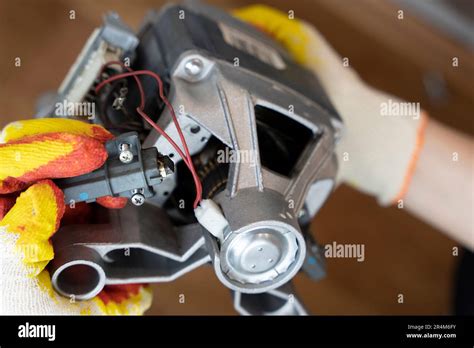 Replacement Of Electric Brushes Of The Electric Motor Stock Photo Alamy
