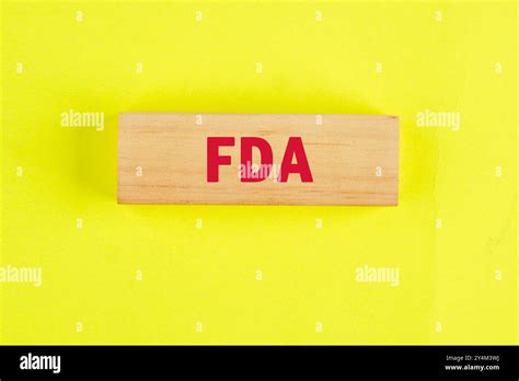 Fda Food And Drug Administration From Wooden Alphabet Cubes On Wooden