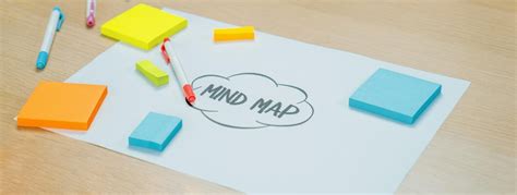 Premium Photo Marketing Strategy Mind Map And Sticky Notes Placed On Office Table Variegated