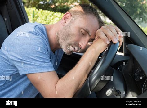 Tired Man Sleeping While Driving Car Stock Photo Alamy