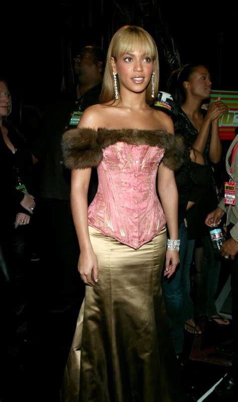 Great Outfits In Fashion History Beyoncés Fur Trimmed Corset Circa 2003 Fashionista