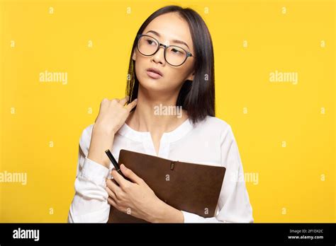 Elegant Woman With Notepad In Hands Official Office Yellow Isolated