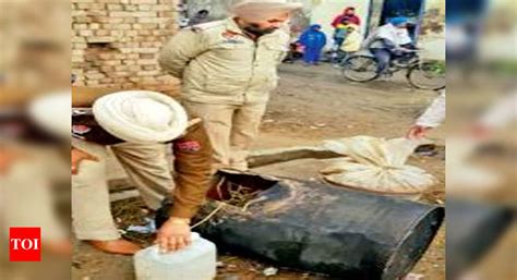 Village Raid Reveals Underground Liquor Distilleries Two Cops