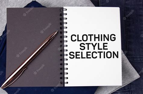 Premium Photo Clothing Style Selection Text On A Notepad On A Stack Of Clothes Selection Of