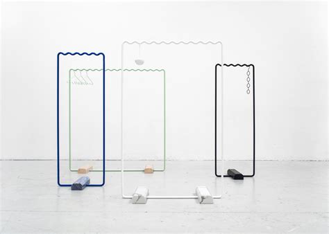 Wave Shaped Clothes Rails Keep Items Evenly Spaced