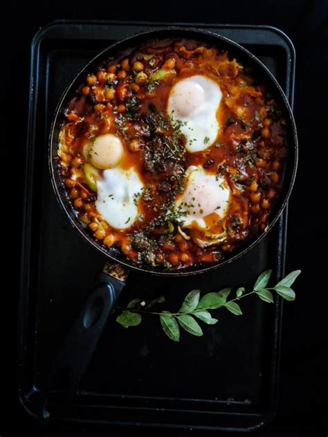 Breakfast Skillet Of Poached Eggs In Chickpeas And Tomato Sauceshakshouka Island Smile