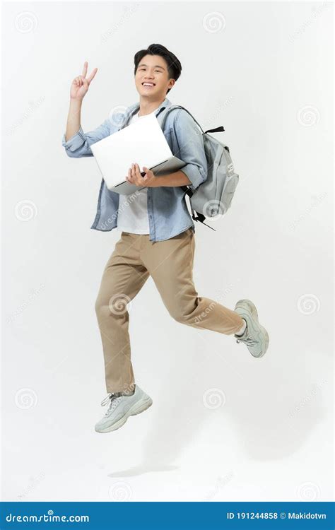 asian programmer seen typing code for a user interface design on dual