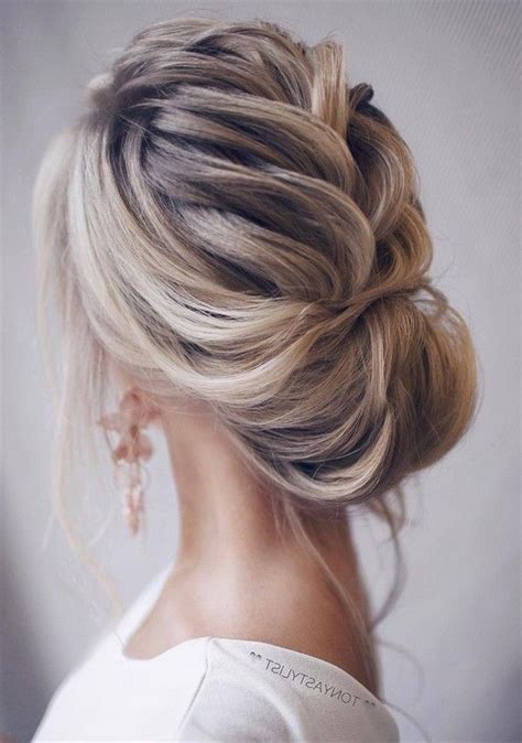 20 Trendy Low Bun Wedding Updos And Hairstyles 2024 Junior Bridesmaid